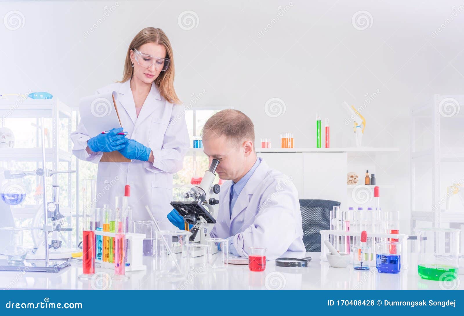 Two Scientists Working in Chemical Laboratory Stock Photo - Image of ... Two Scientists Working in Chemical Laboratory Stock Photo - Image of ...
