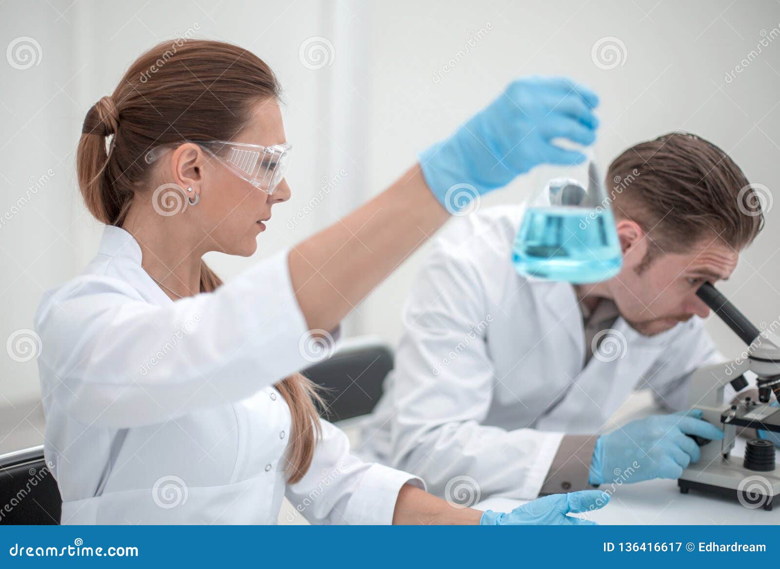 Two Scientists are Working in Laboratory. Stock Image - Image of ...
