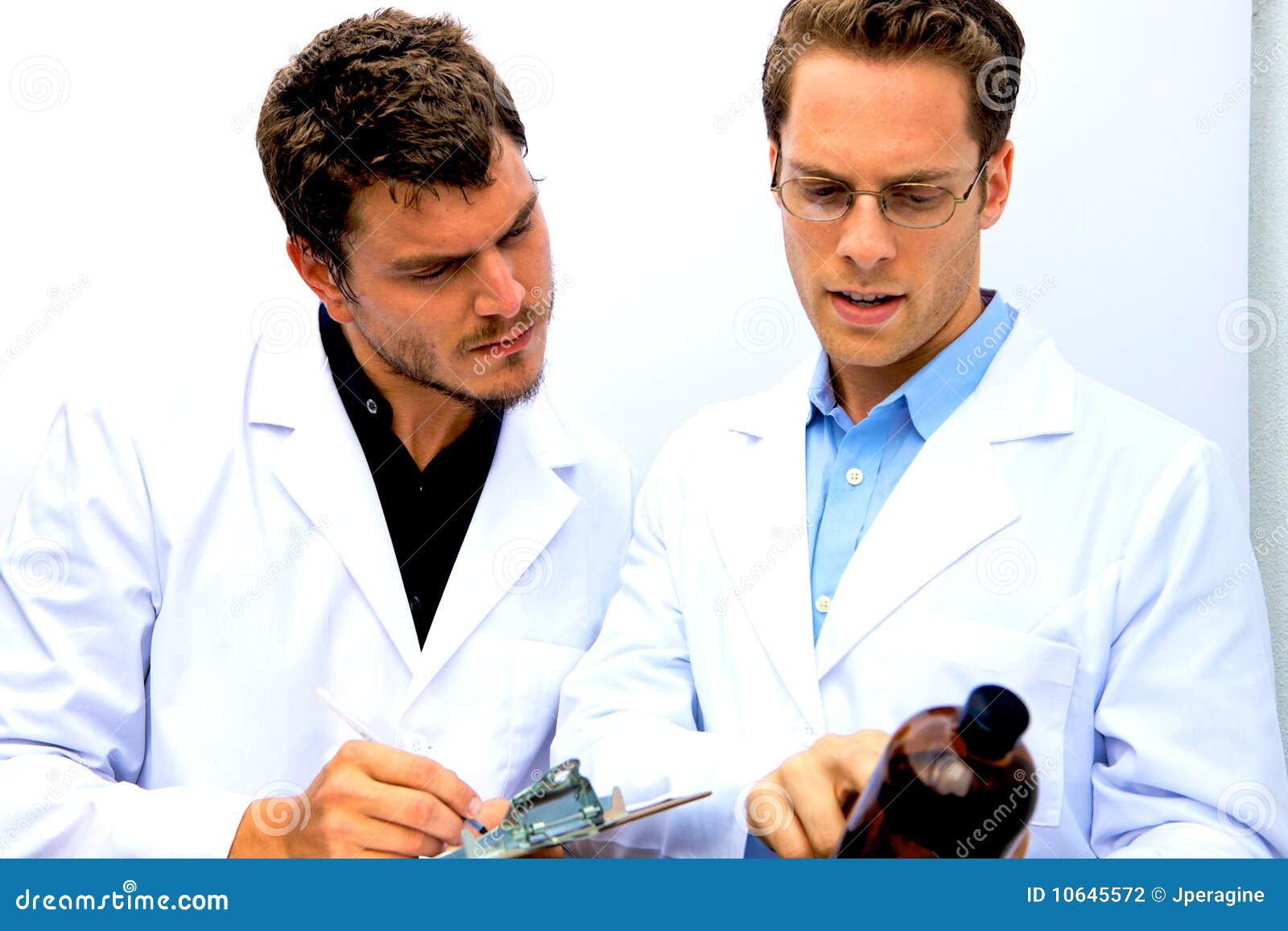 Two Scientists Working Together Stock Photo - Image of healthcare ... Two Scientists Working Together Stock Photo - Image of healthcare ...