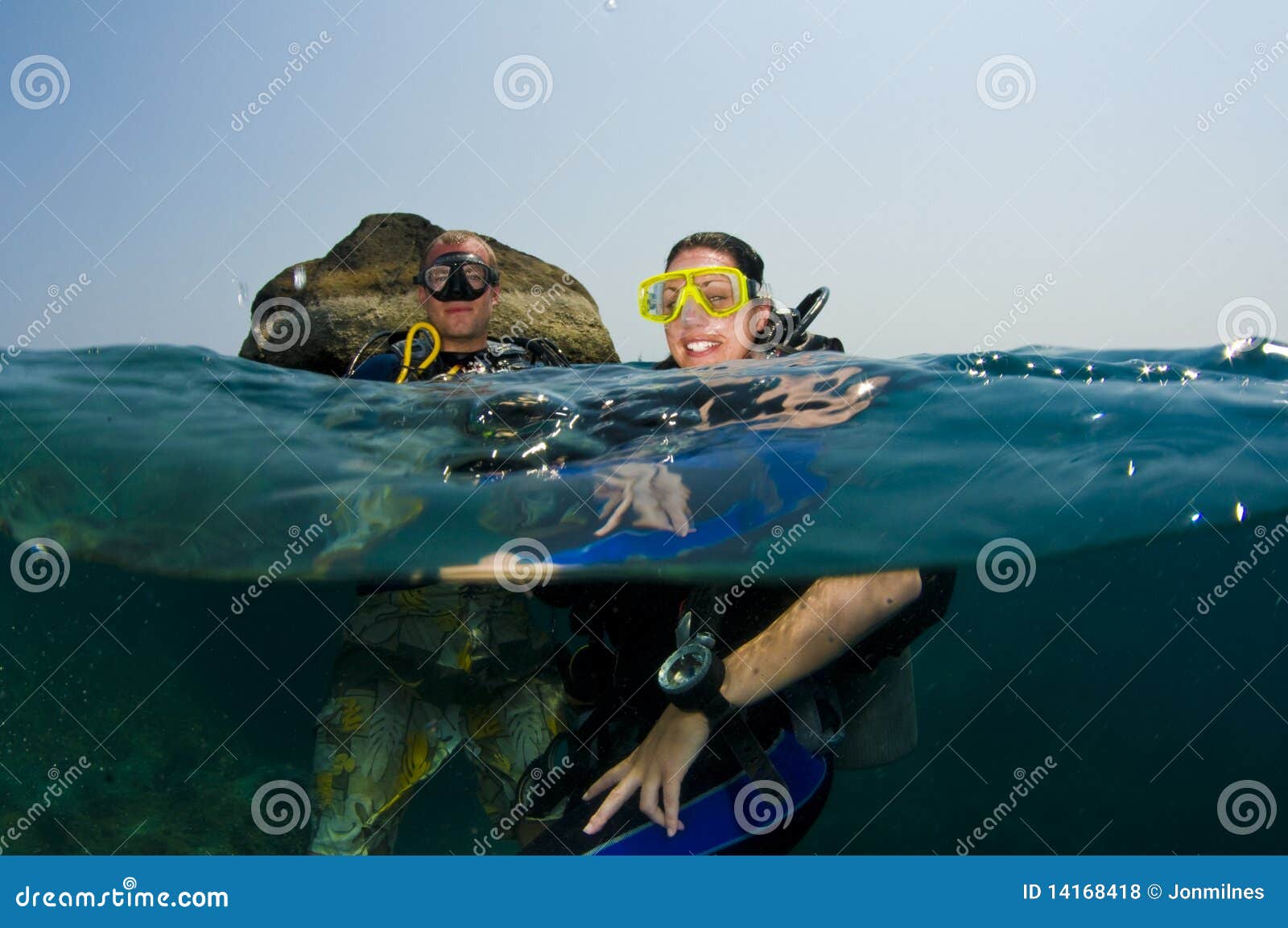 Two Scuba Divers on Surface Stock Photo - Image of dive, swimming: 14168418