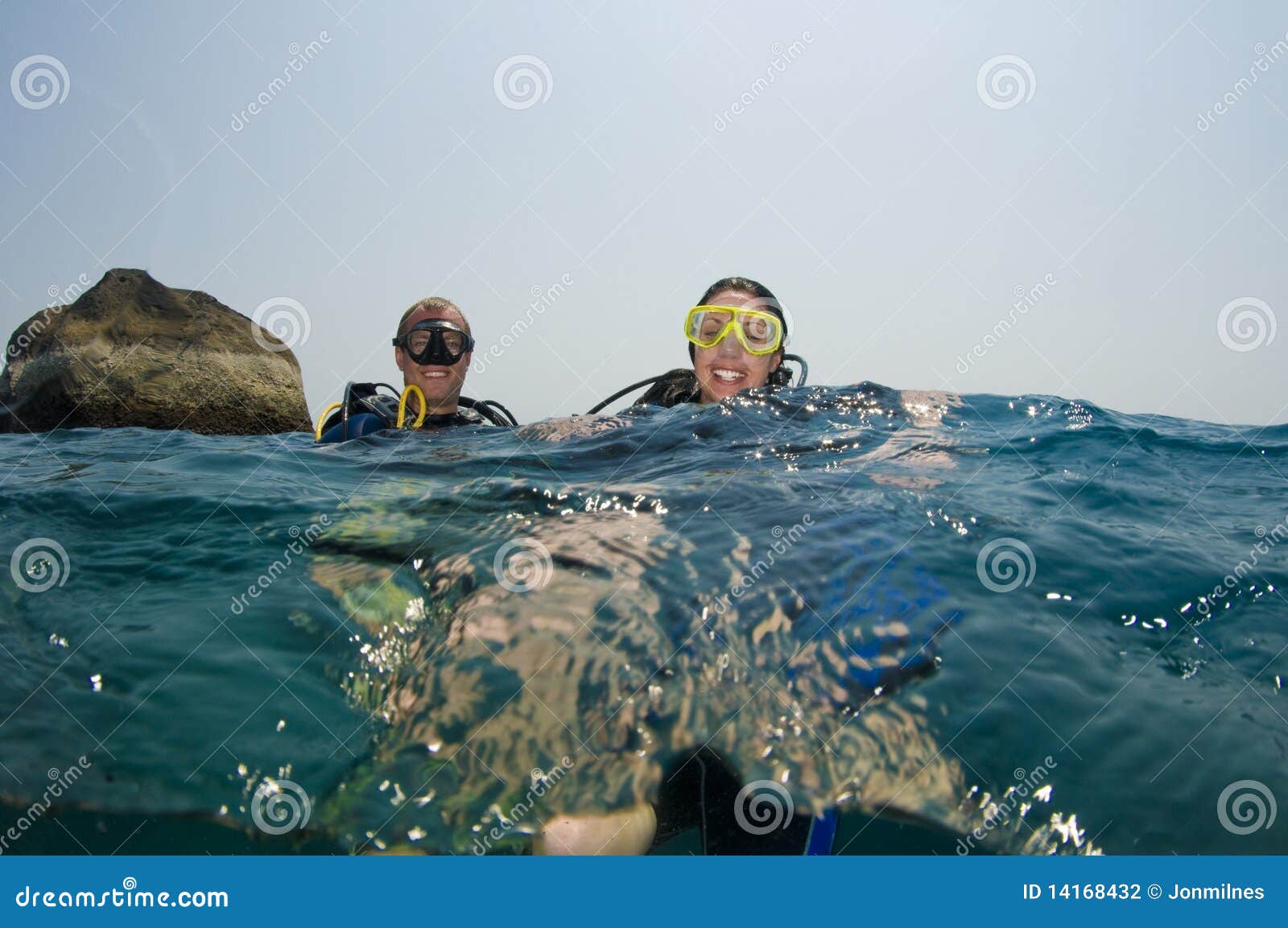 Two Scuba Divers on Surface Stock Photo - Image of happy, underwater ...
