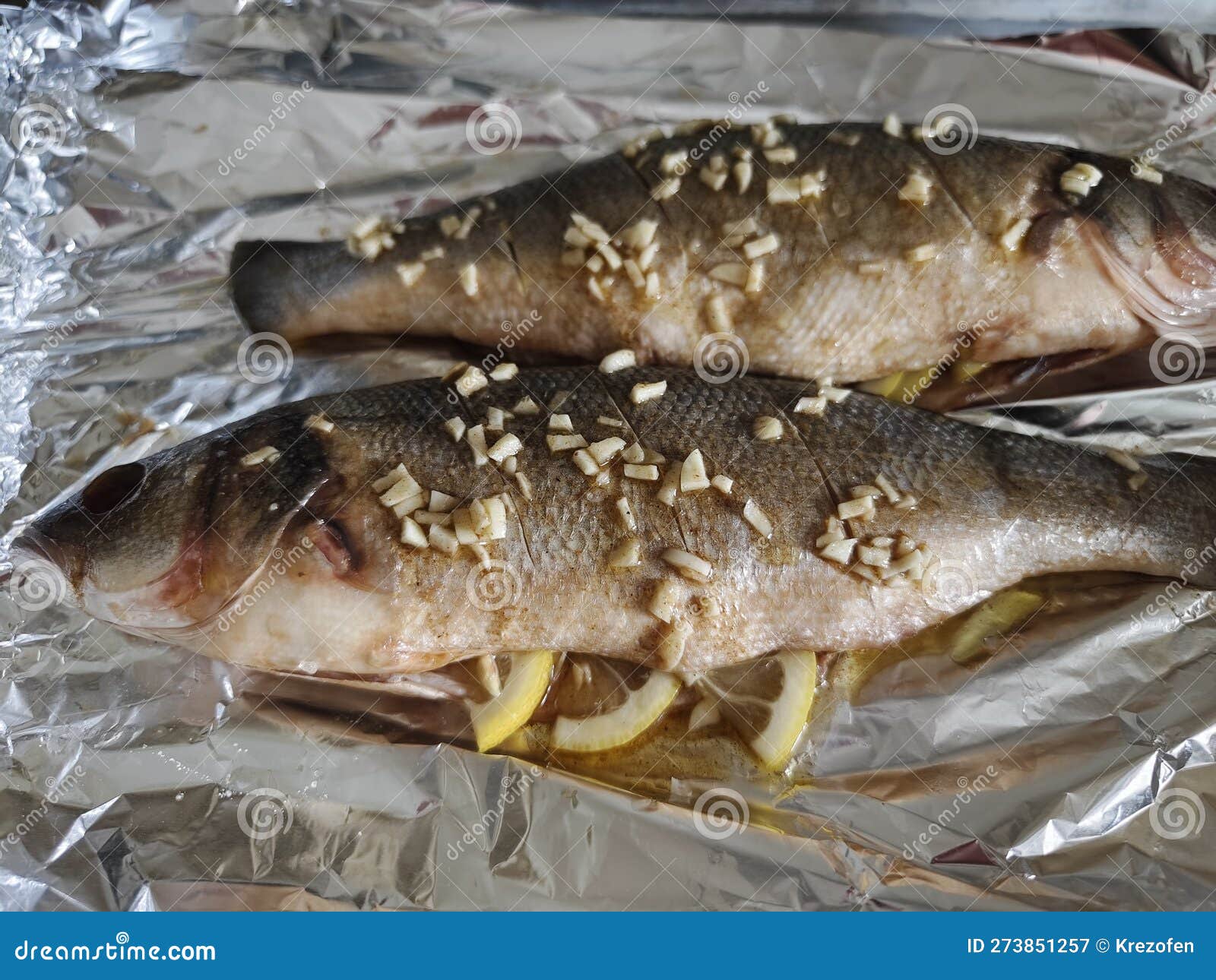 Two Sea Bass Fish Marinated and Laid Out on a Baking Tray Stock Image ...