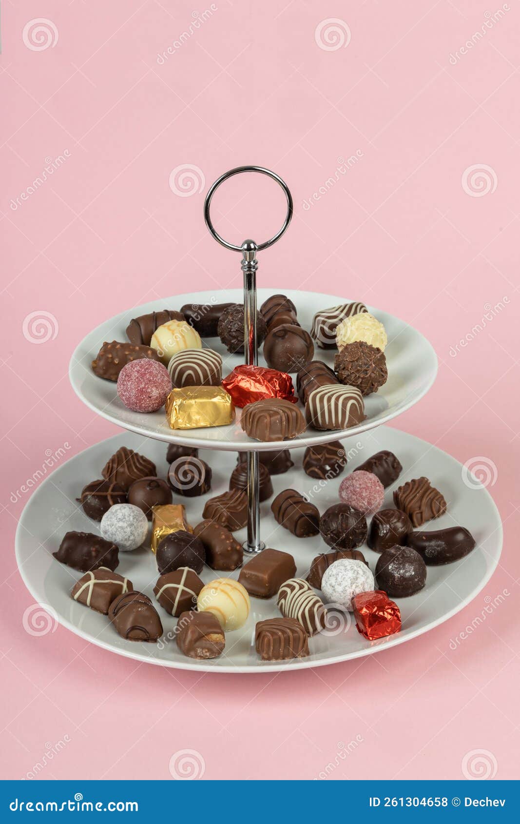 Two Section Cake Stand with Chocolate Candies. Two Tier Plate Stock ...