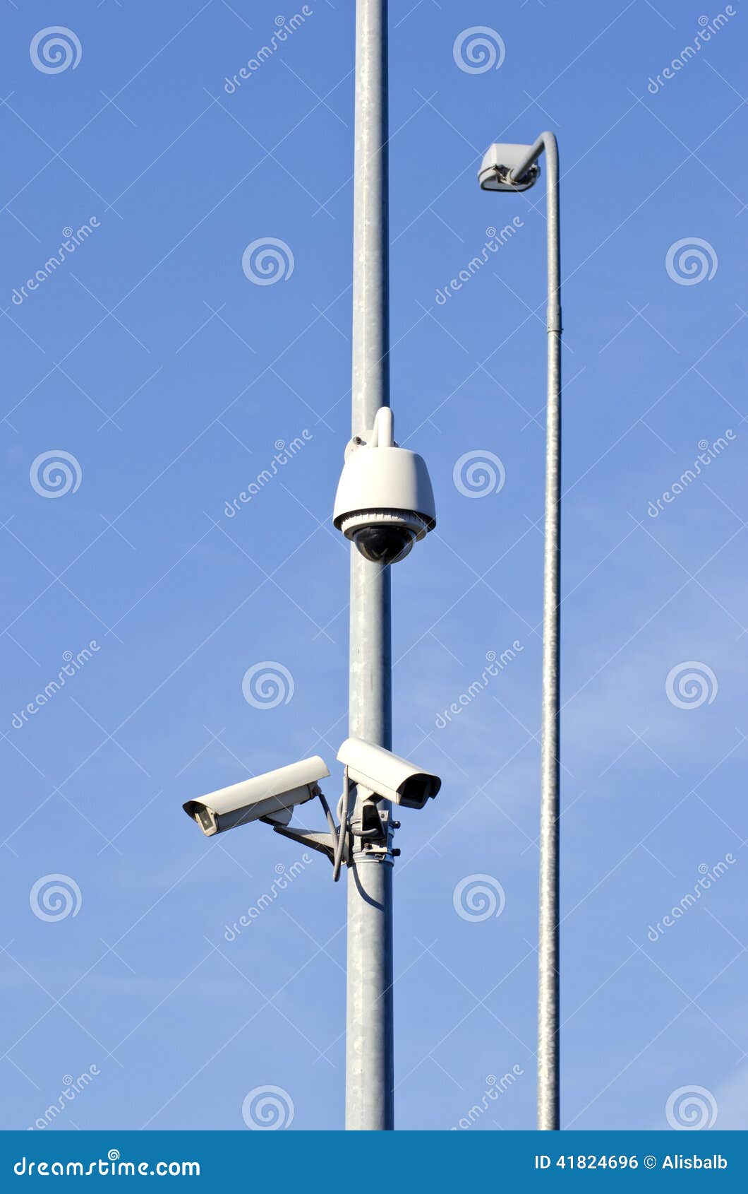 Two Security Cameras on Electric Post and Lamp Stock Photo - Image of ...