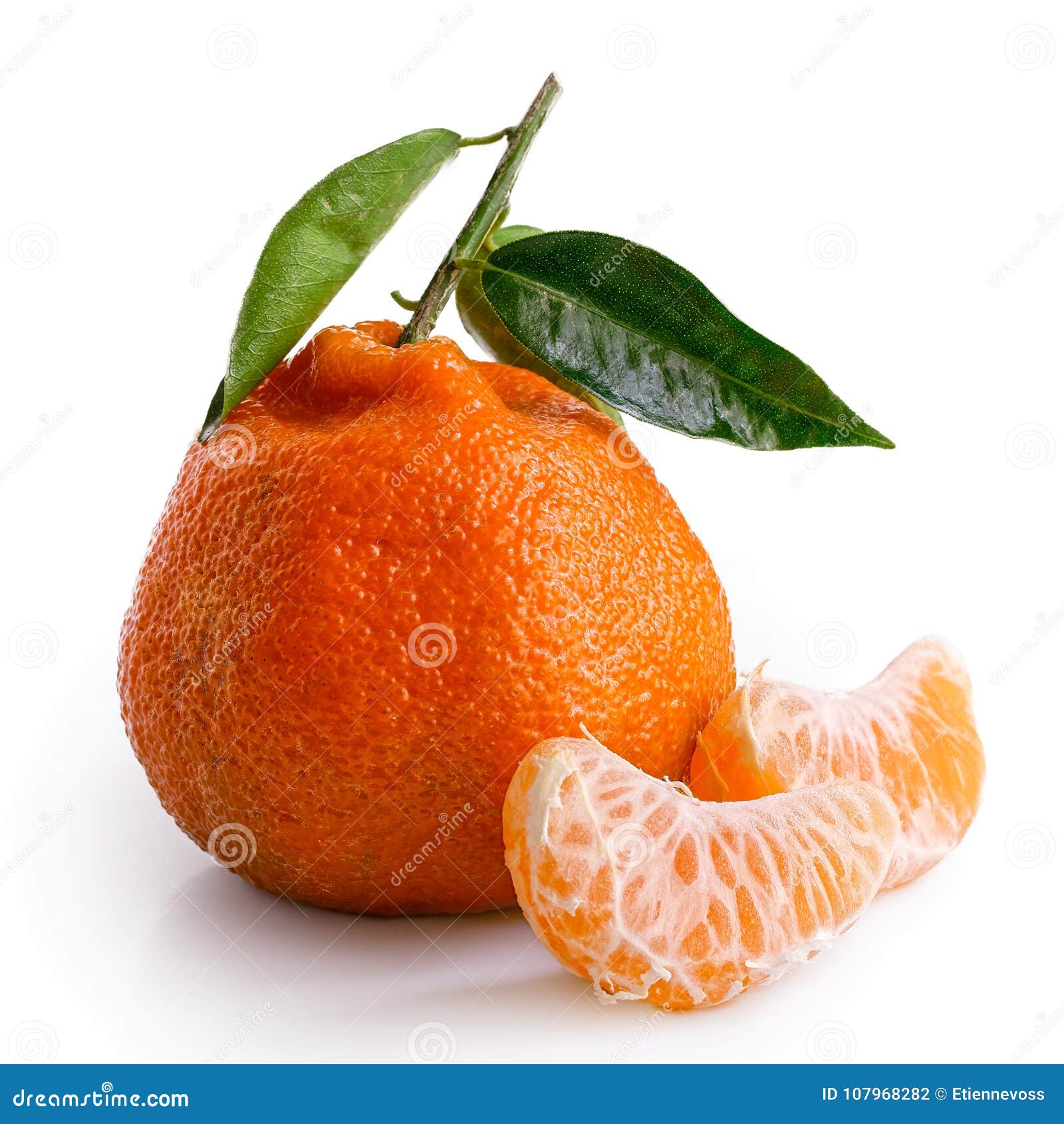 Two Segments of a Mandarin Next To Whole Mandarin with Leaves is Stock ...