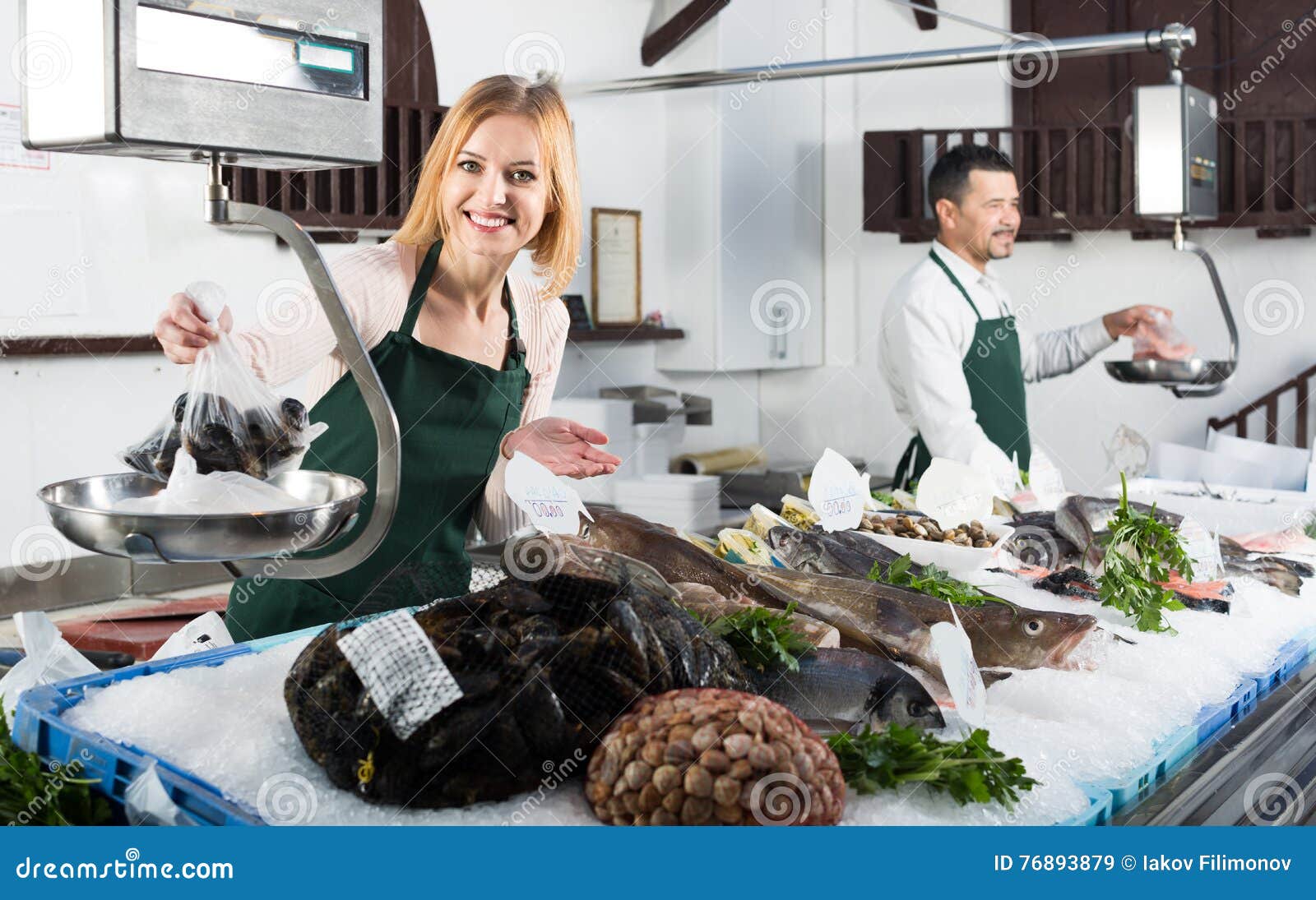 Two Sellers in Fish Section of Supermarket Stock Image - Image of ...