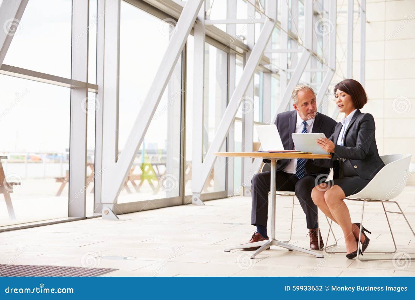 Two Senior Business Colleagues at Meeting in Modern Interior Stock ...