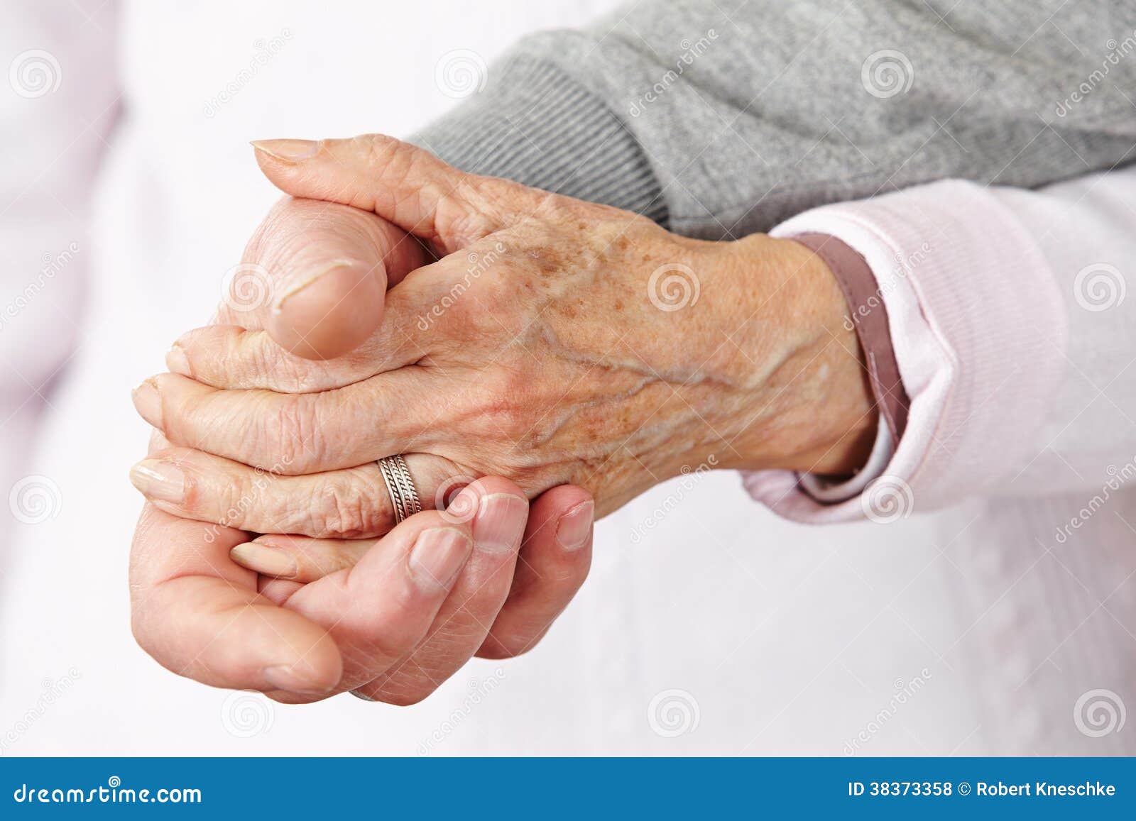 Two Senior Citizens Holding Hands Stock Photo - Image of hands ...