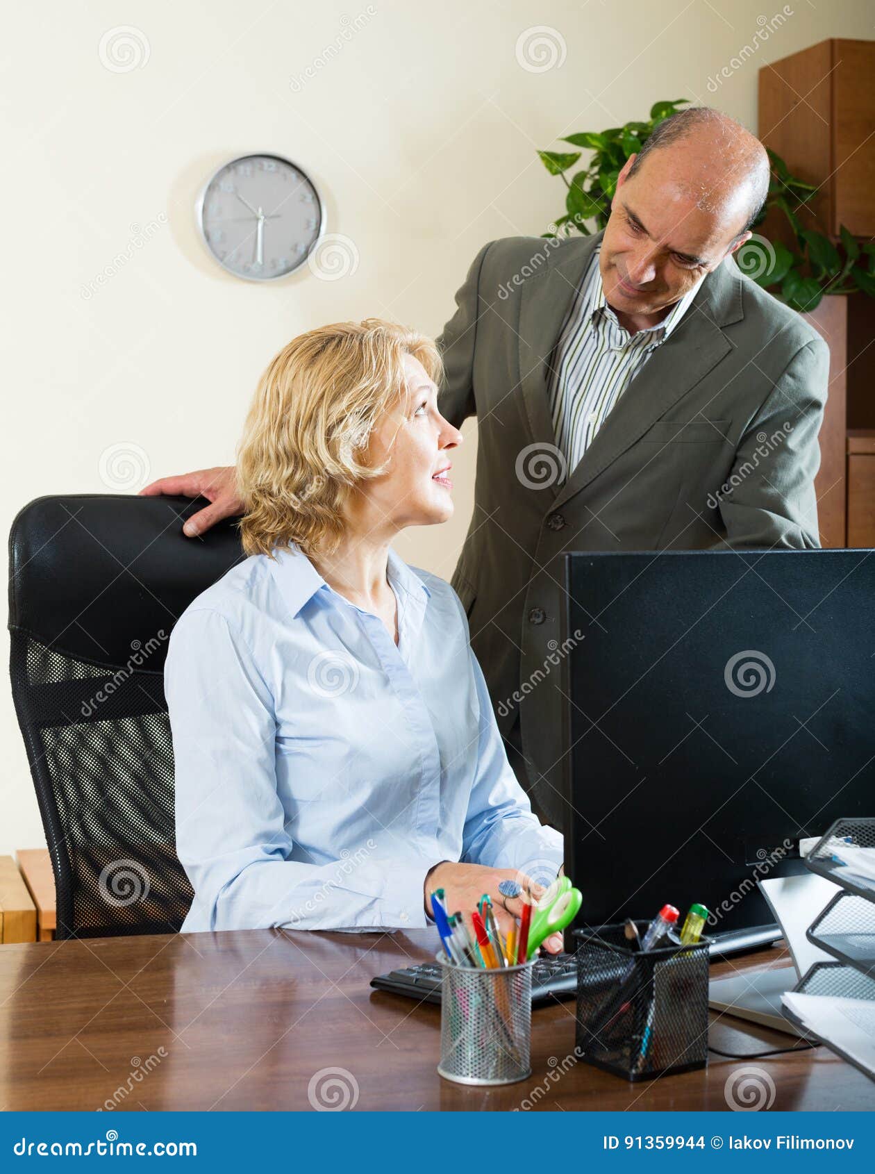 Two Senior Colleagues in Office Stock Photo - Image of indoor, papers ...