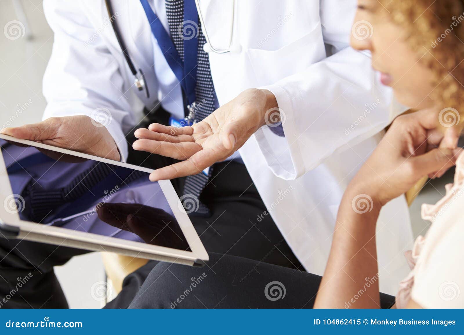 Two Senior Doctors Using Tablet Computer, Mid Section Stock Image ...