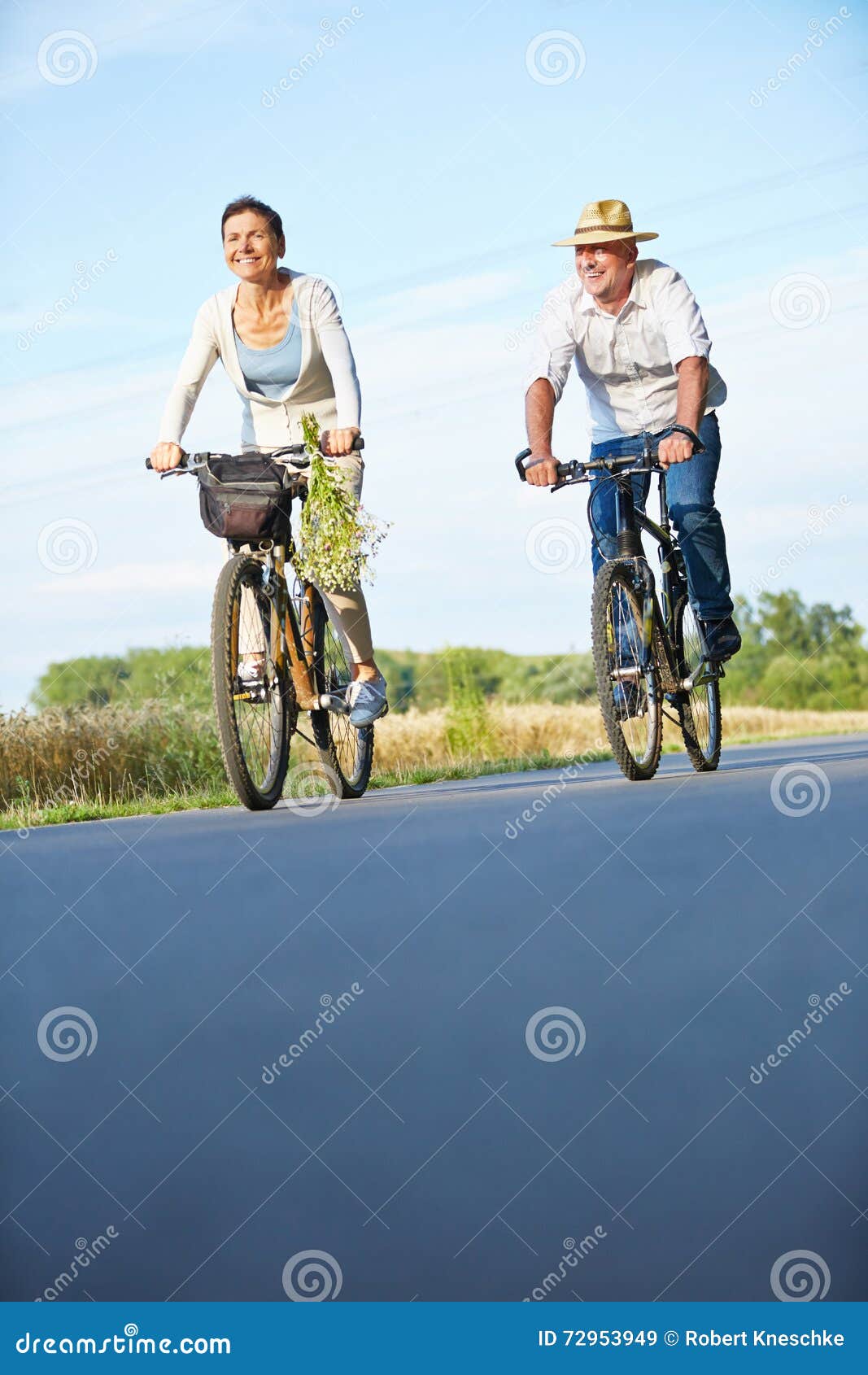 Two Senior People Riding Bikes in Summer Stock Image - Image of fitness ...
