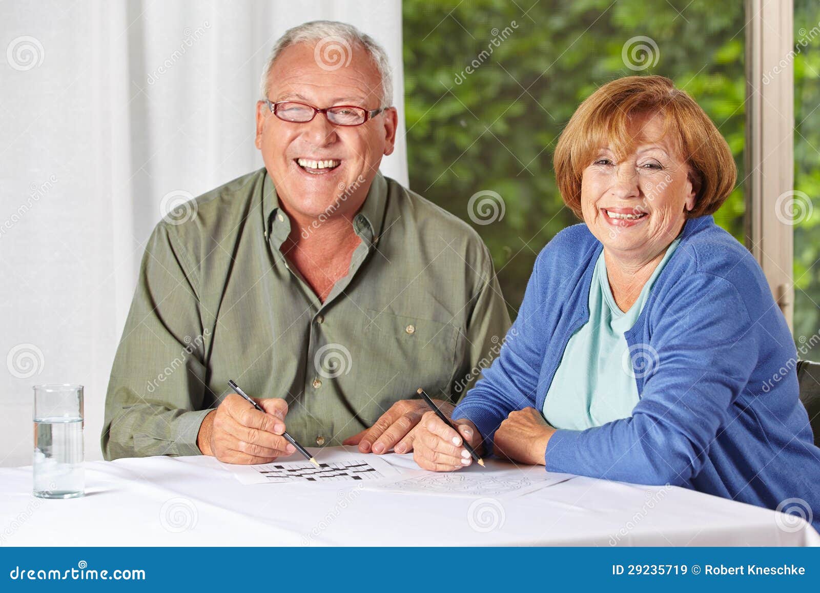 Two Senior People Solving Riddles Stock Image - Image of happy ...