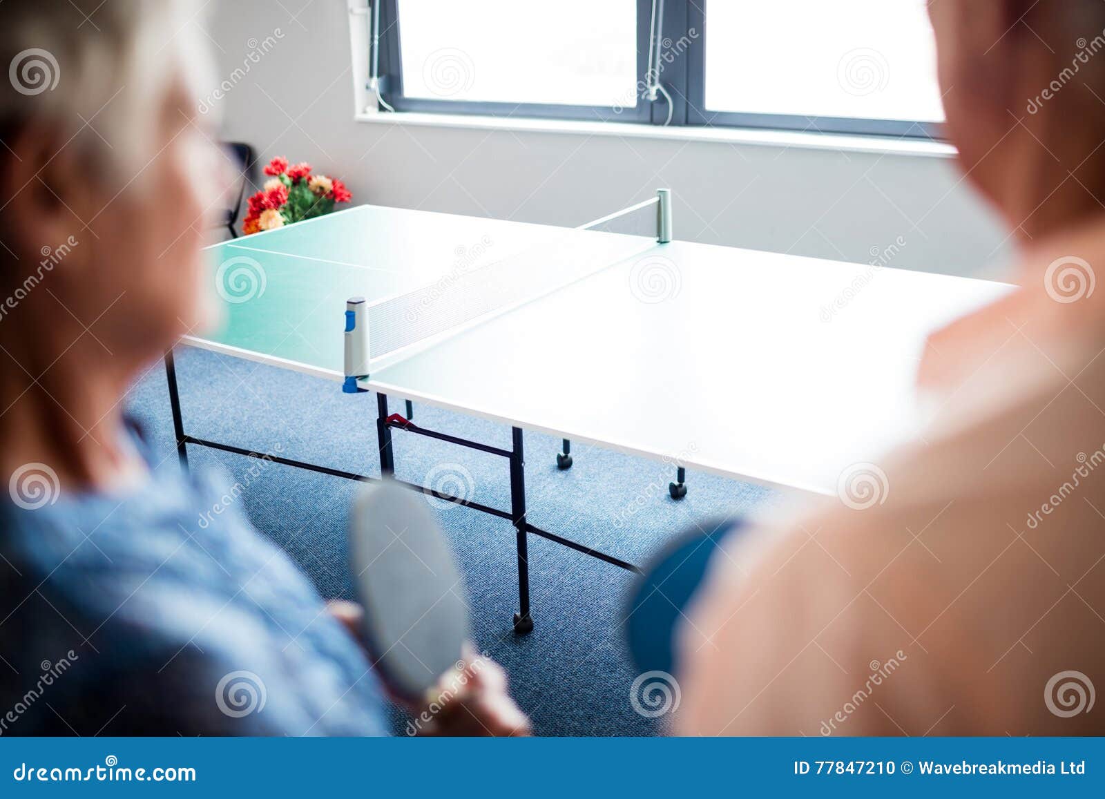 Two Seniors Front of a Ping Pong Table Stock Photo - Image of golden ...
