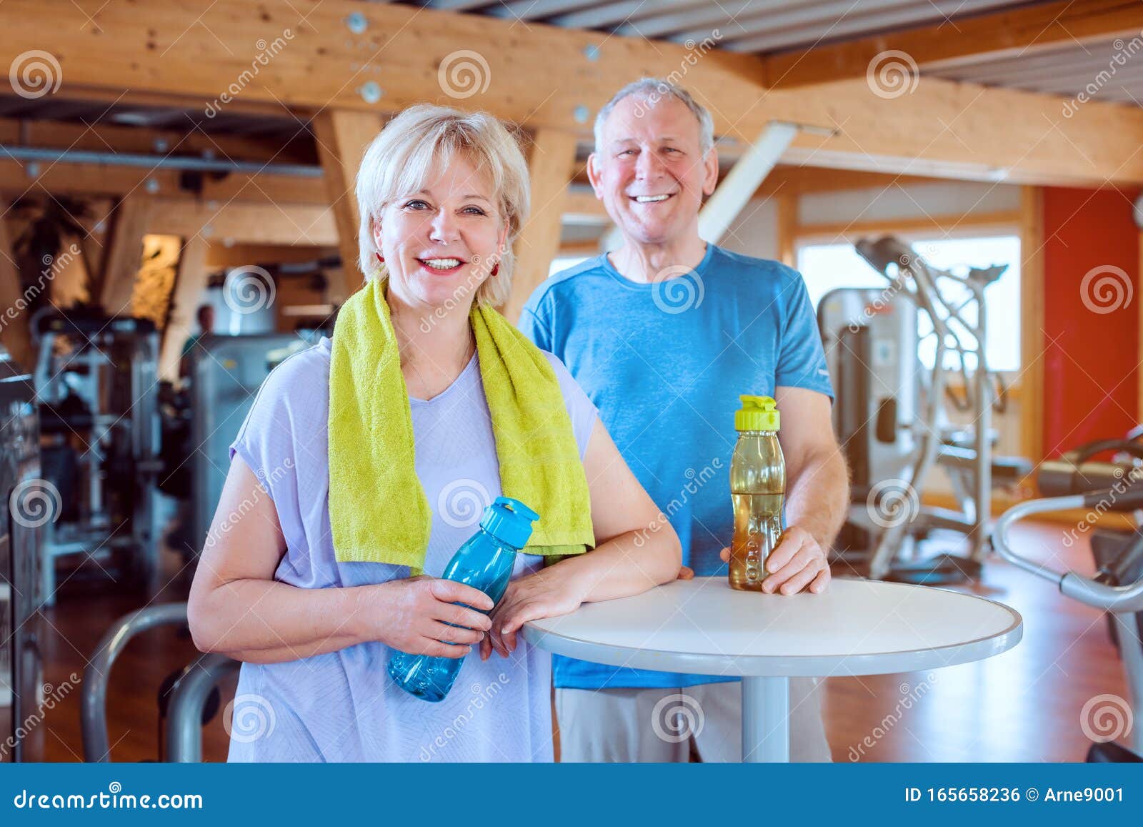 Two Seniors Having a Break from Exercising in the Gym Stock Photo ...