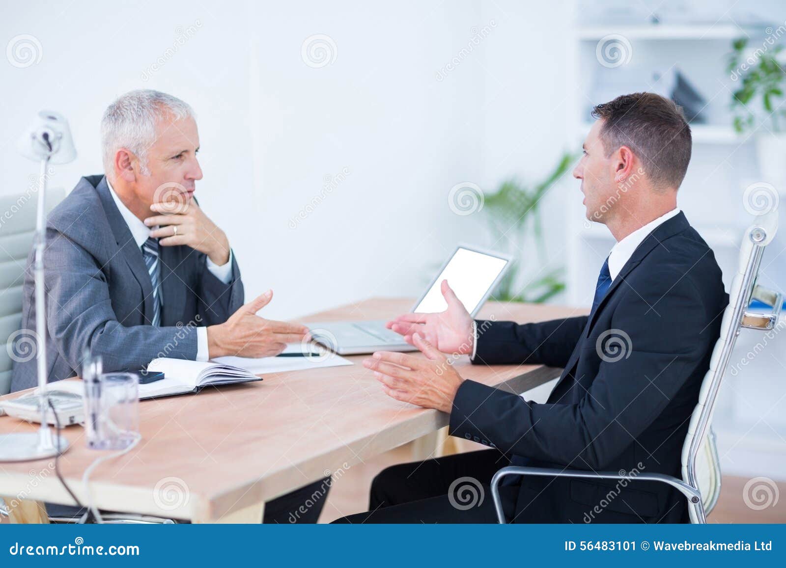 Two Serious Businessmen Speaking and Working Stock Image - Image of ...