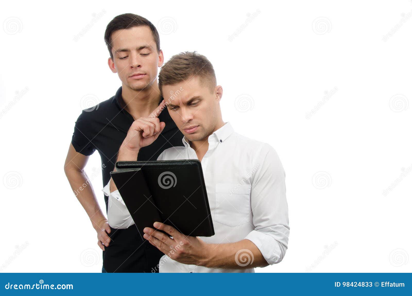 Two Serious Guys are Working on the Project. Tablet and Technology ...