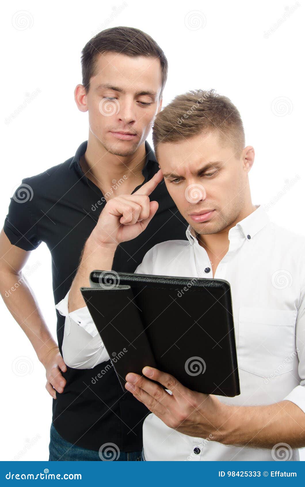 Two Serious Guys are Working on the Project. Tablet and Technology ...