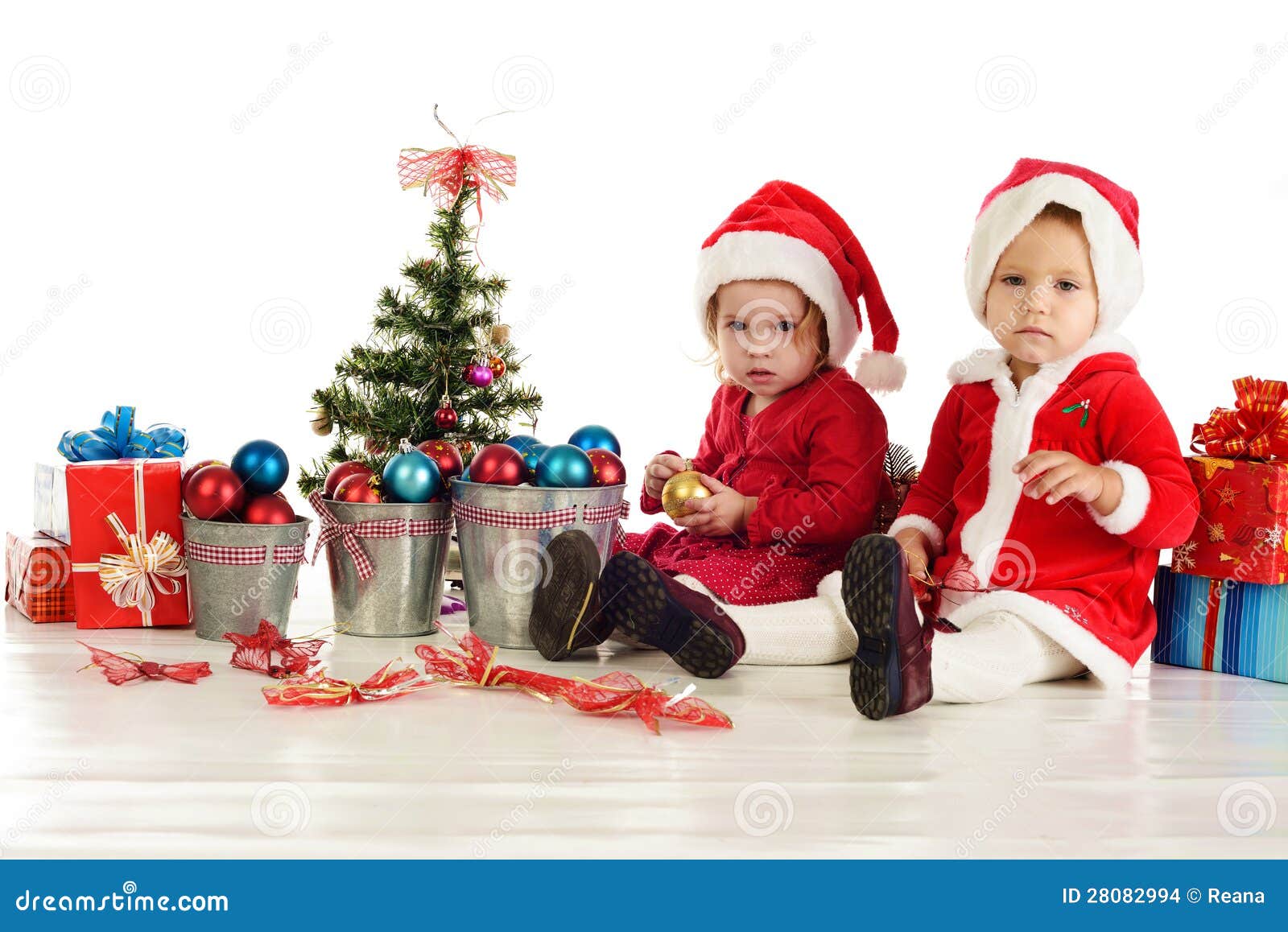 Two serious santa girls stock photo. Image of beautiful - 28082994