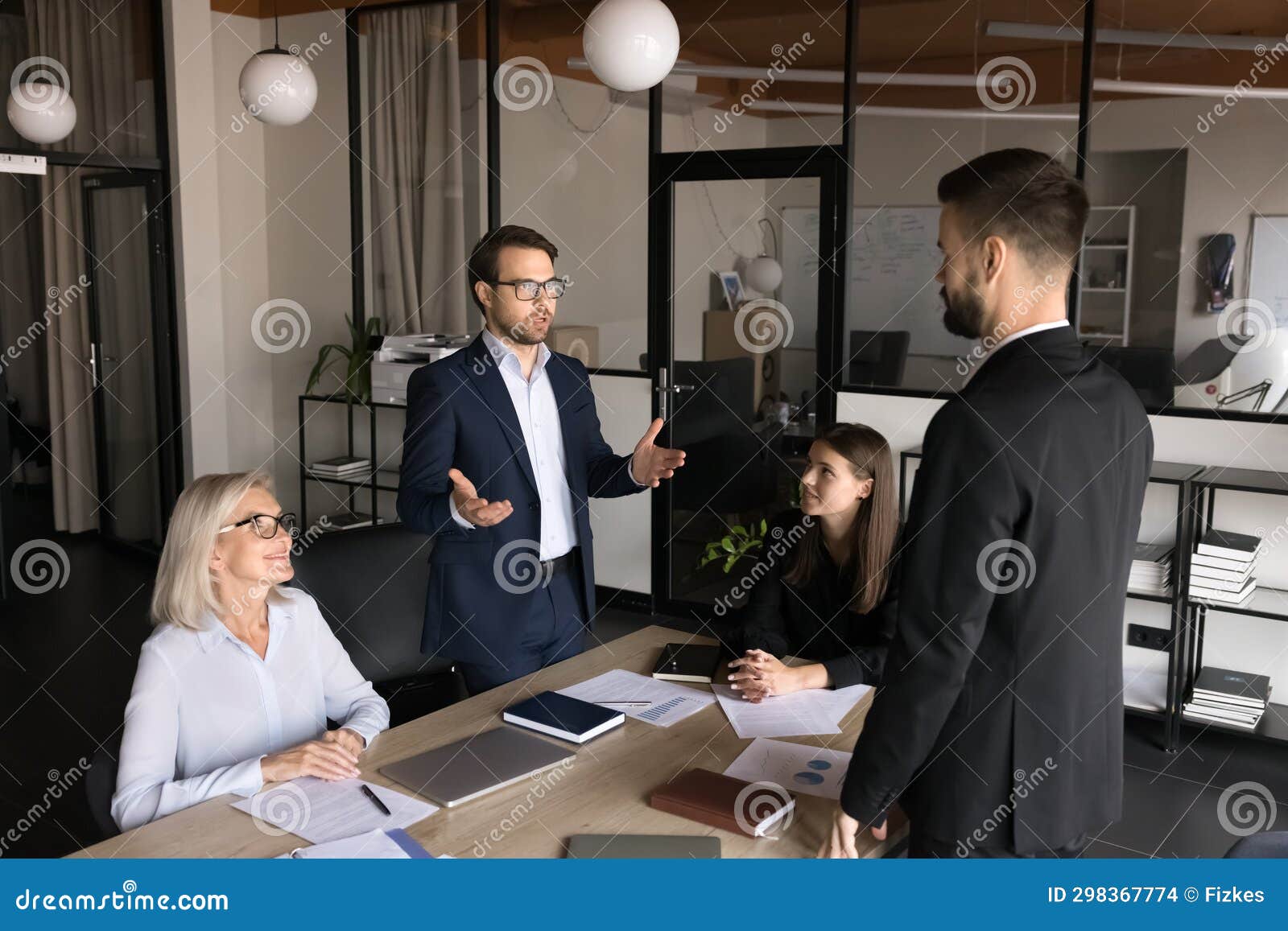 Two Serious Young Business Partners Men Talking on Corporate Meeting ...