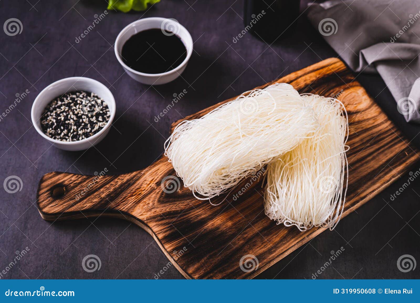 Two Servings of Funchose Dry Rice Noodles on a Board on the Table Stock ...