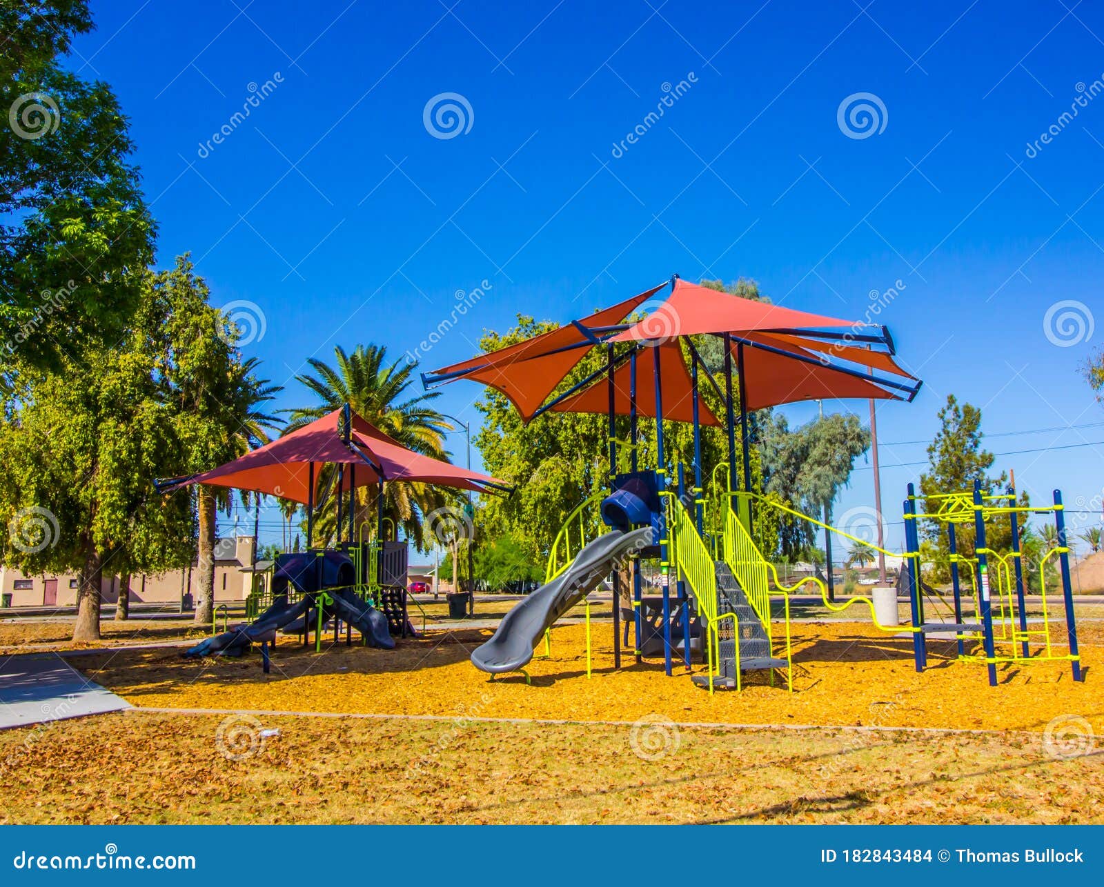 Two Sets of Playground Equipment with Canopies Stock Photo - Image of ...