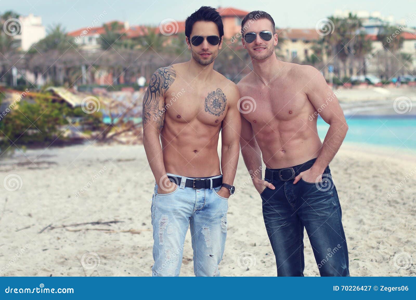 Two guys on the beach stock image. Image of caucasian - 70226427