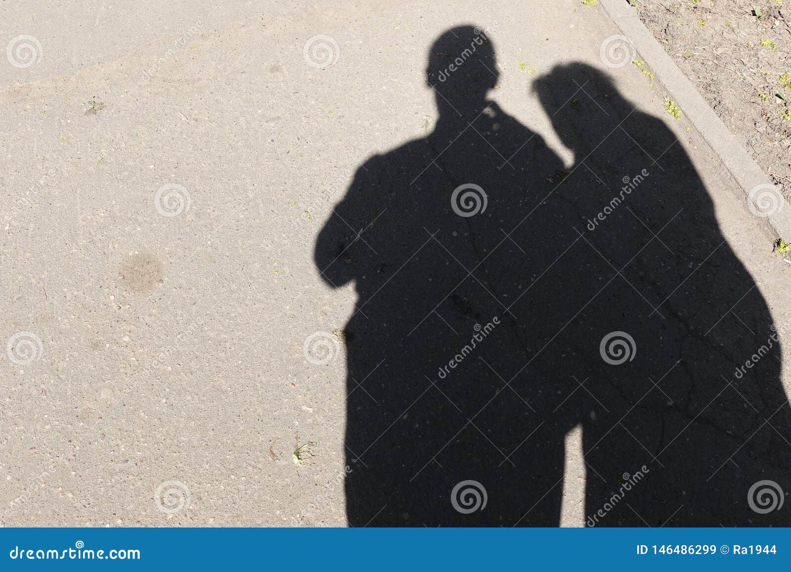 Two Shadows of a Man and a Woman on Asphalt Stock Image - Image of ...