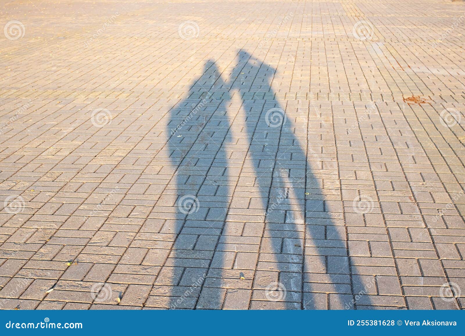 Two Shadows of People on the Sidewalk Stock Photo - Image of pattern ...