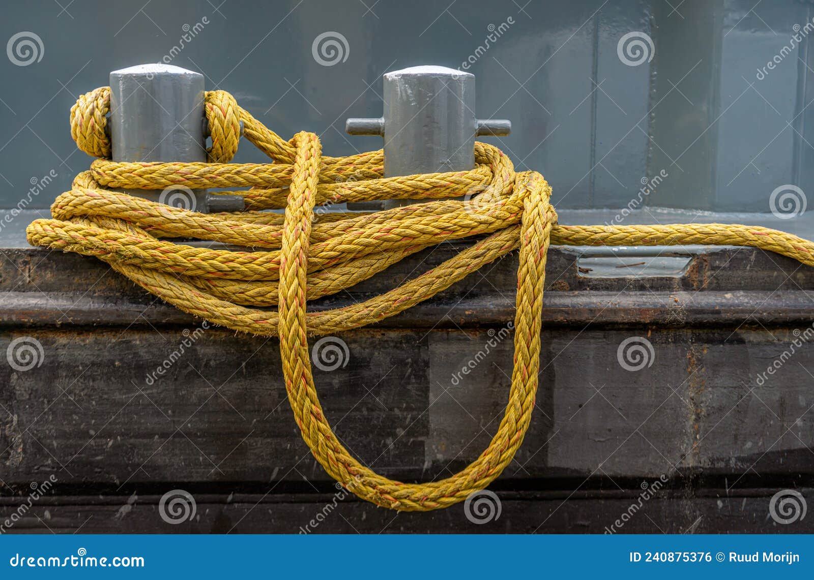 Two Shipboard Bitts and a Yellow Mooring Line from Close Stock Photo ...