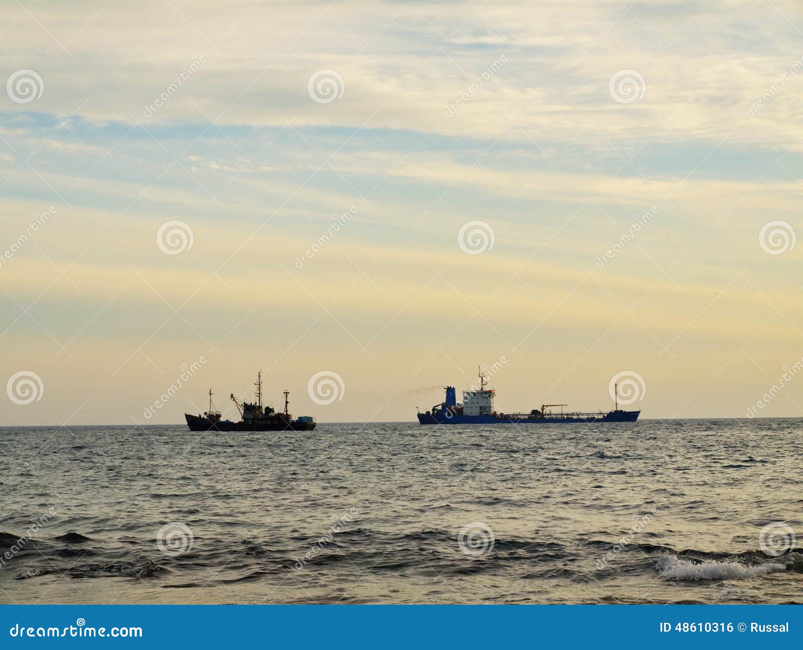 Two ships apart in sea stock photo. Image of back, boat - 48610316