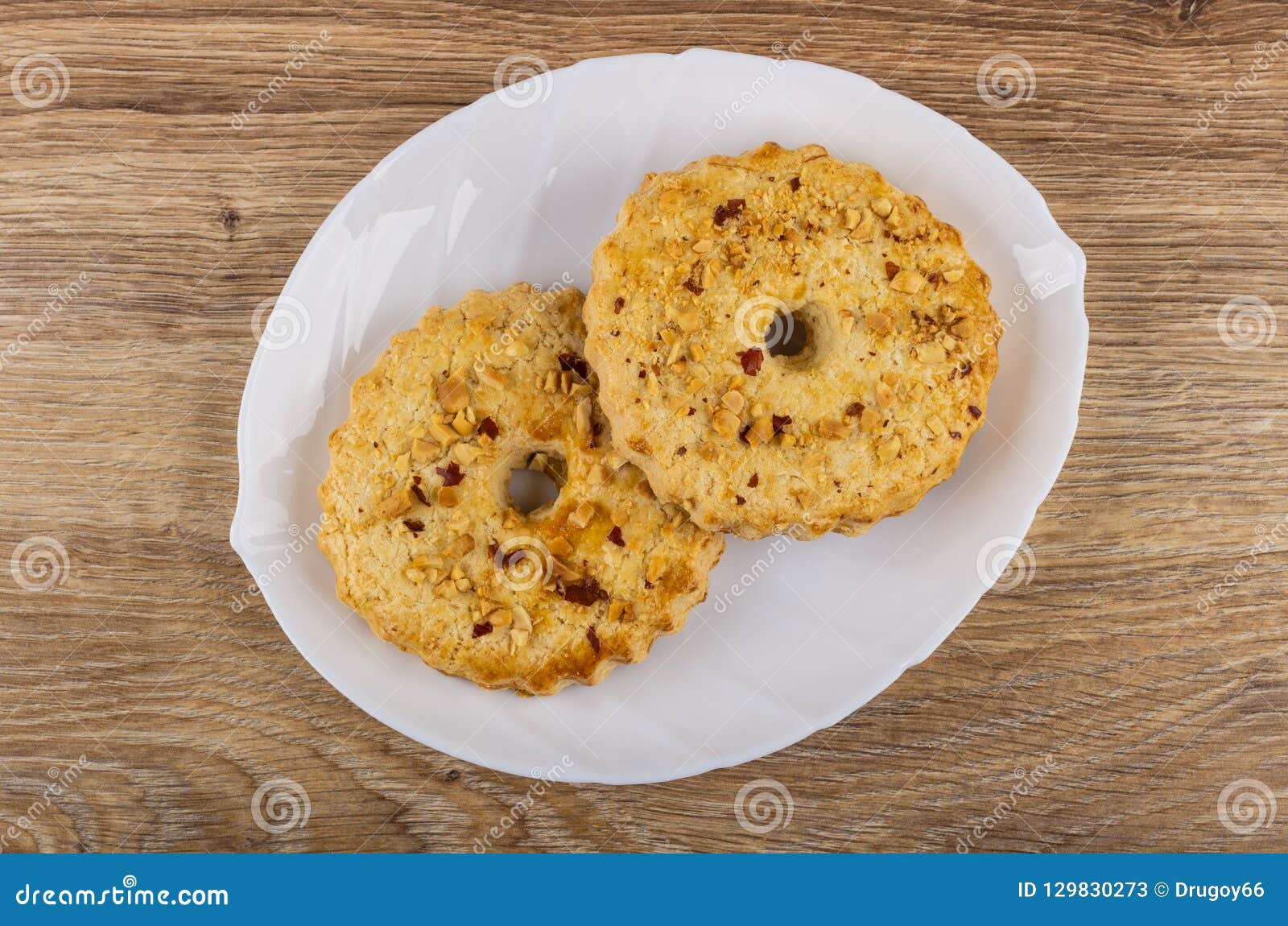 Two Shortbread Rings with Peanuts in Dish on Table. Top View Stock ...