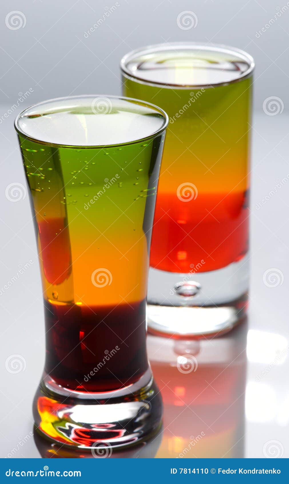 Two Shot Glasses with Colorful Cocktails Stock Photo - Image of risk ...