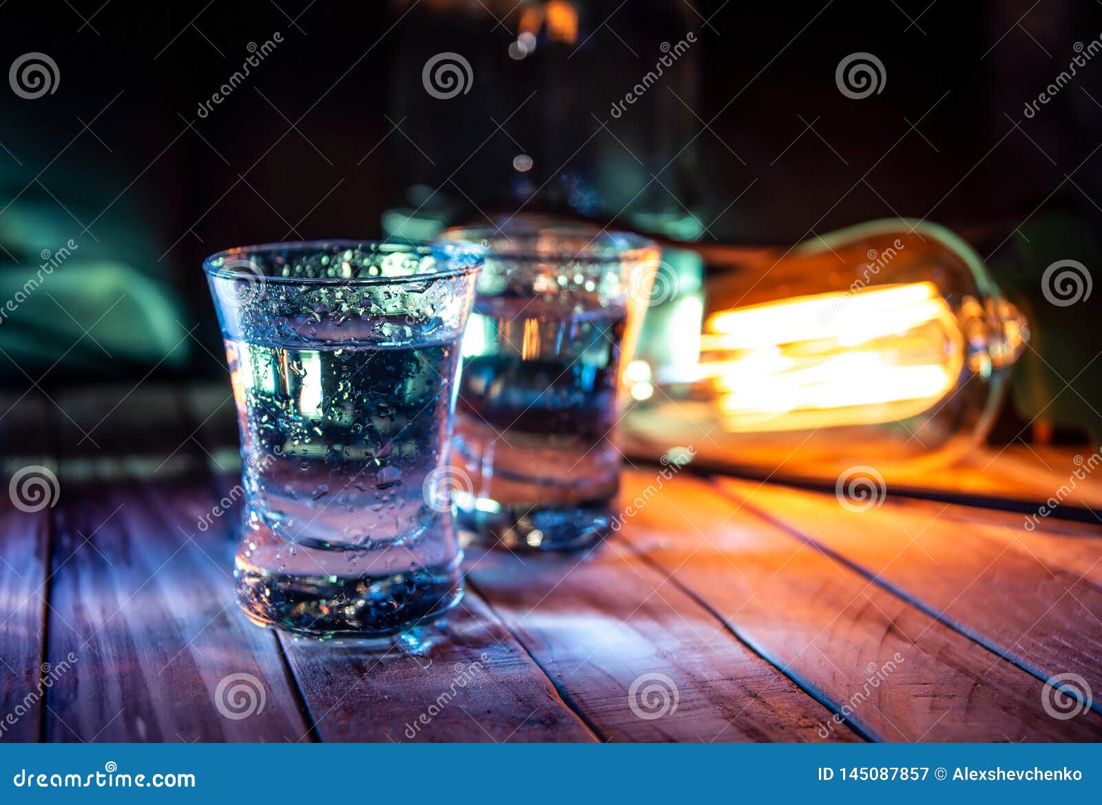 Two Shots of Vodka in the Multiple Bar Lights, Close-up Stock Image ...