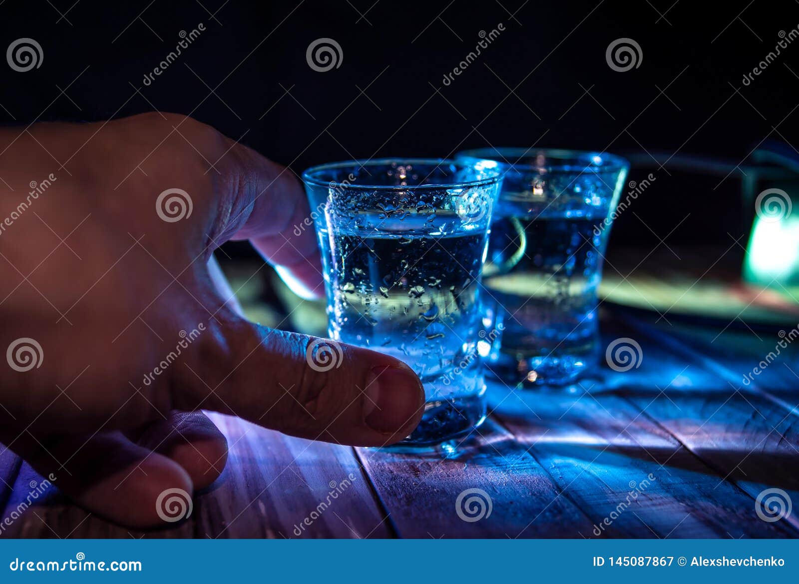 Two Shots of Vodka in the Multiple Bar Lights, Close-up Stock Image ...