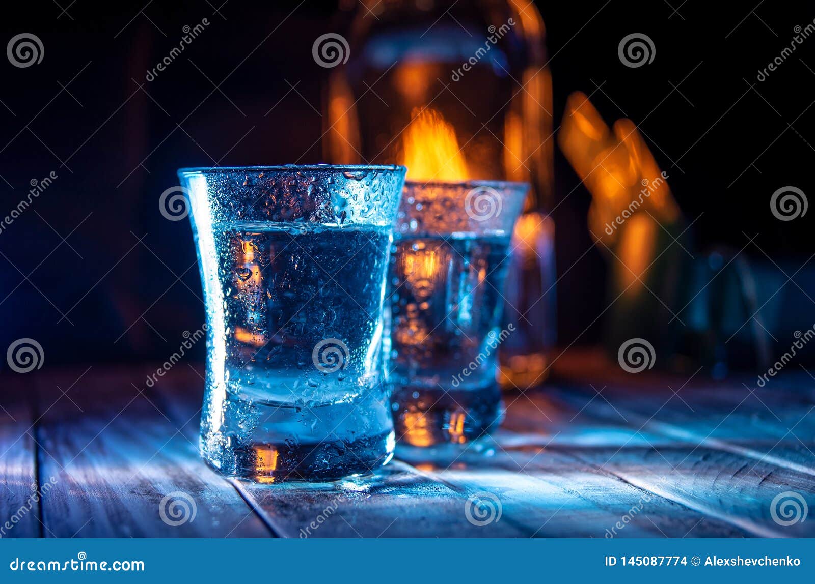 Two Shots of Vodka in the Multiple Bar Lights, Close-up Stock Photo ...