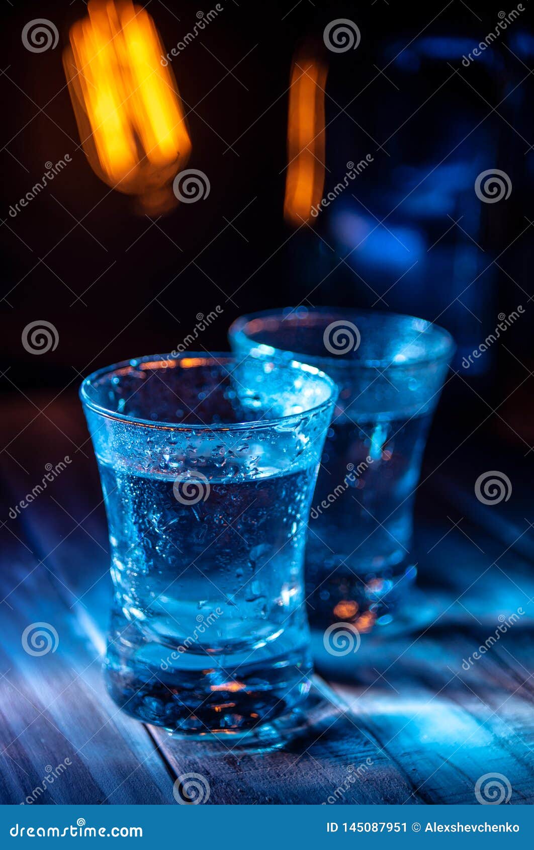 Two Shots of Vodka in the Multiple Bar Lights, Close-up Stock Image ...