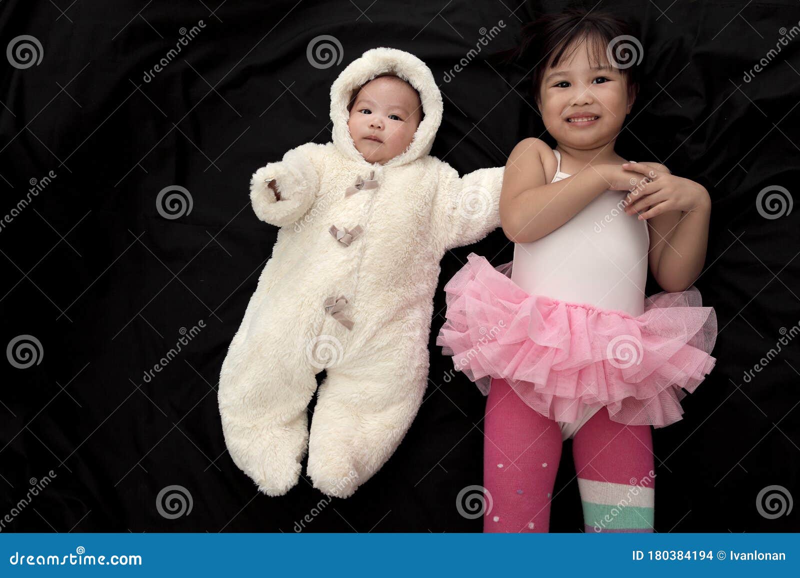 Two Siblings Together in the Black Background Stock Photo - Image of ...