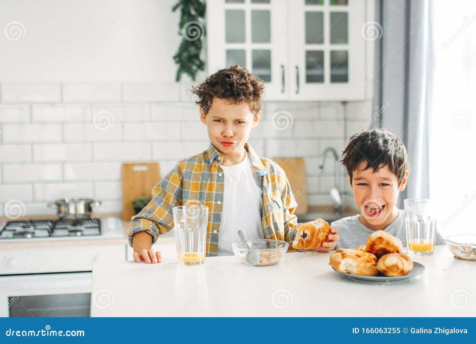 Two Siblings Tween Boys Real Brothers with Fun Faces Having Breakfast ...