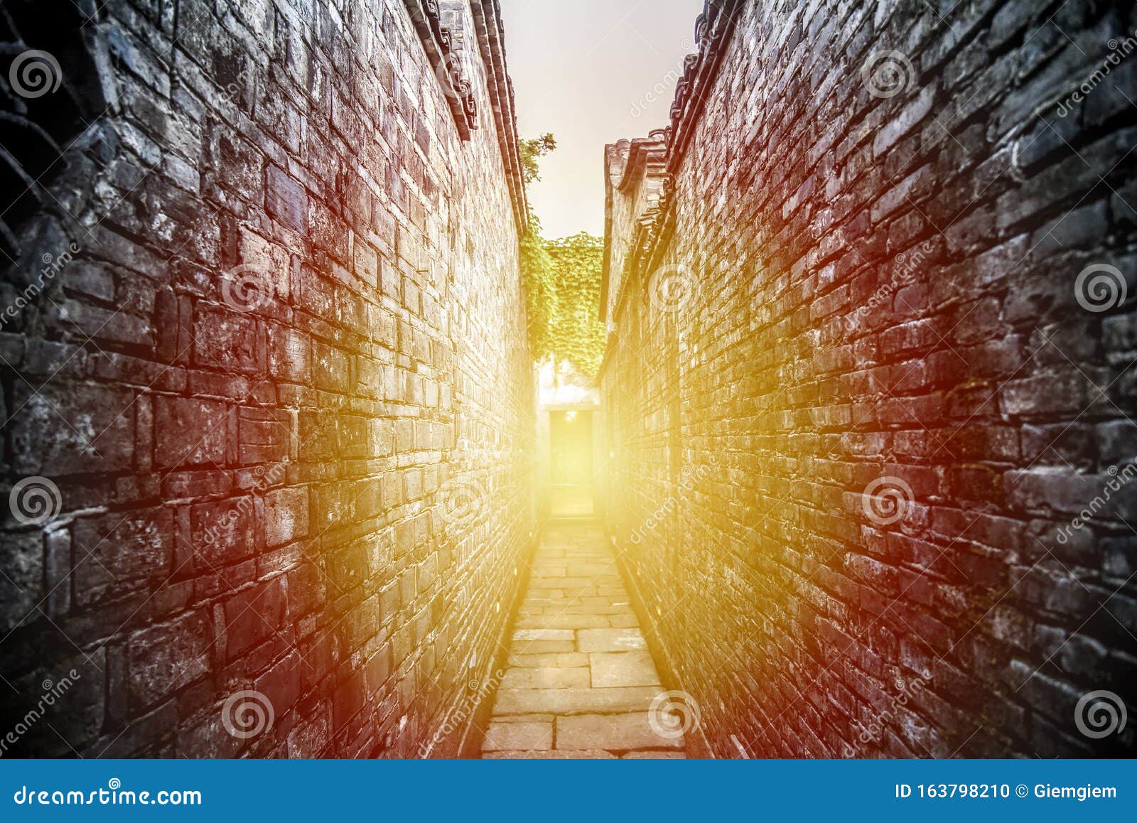 Two Sided Brick Wall with a Small Pathway, If Go Straight Forward, You ...