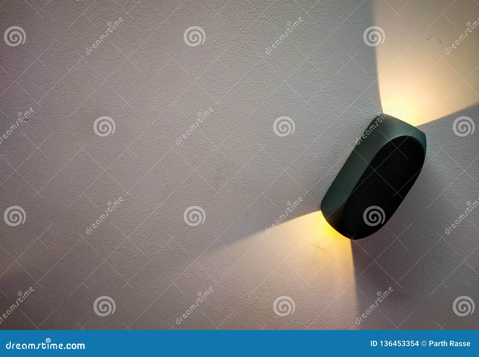 Two Sided Wall Light with Yellow Light Stock Photo - Image of style ...