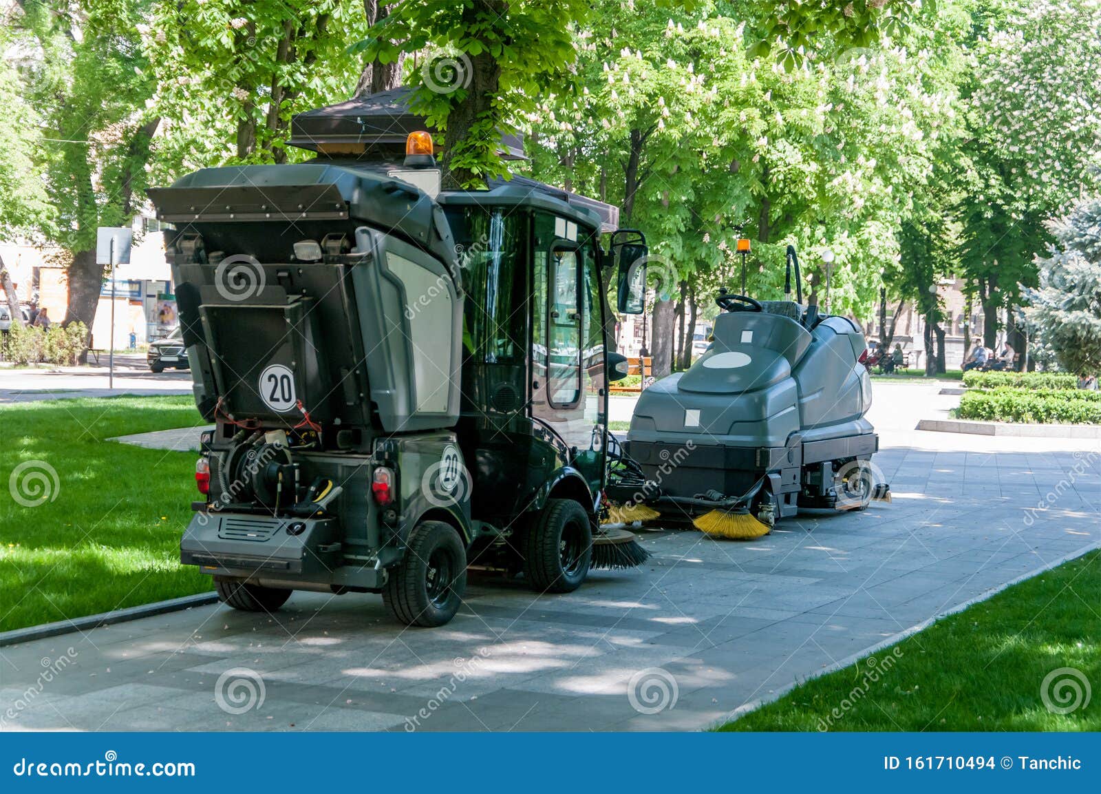 Two Sidewalk Cleaning Machines in the Park Stock Photo - Image of ...