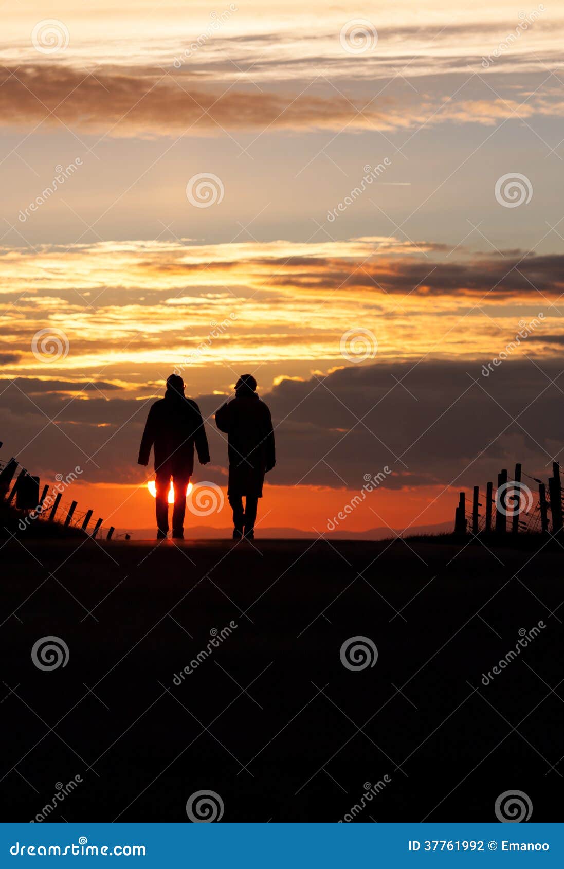 Two Silhouetted Seniors Walking in Sunset Stock Photo - Image of dusk ...