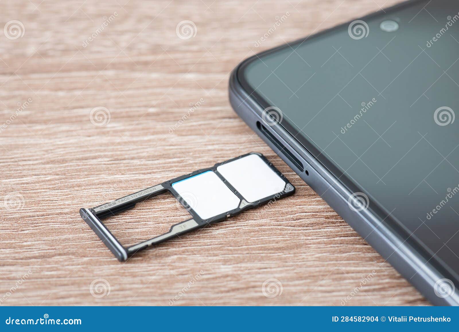 Two Sim Cards of Different Mobile Operators in a Phone Tray Stock Photo ...