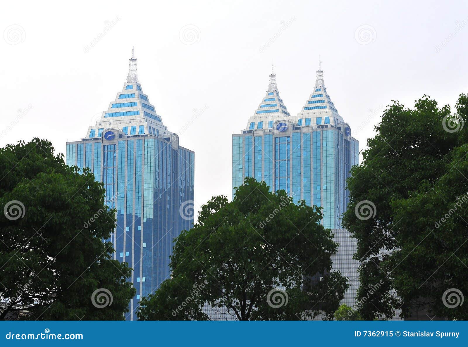 Two similar skyscrapers stock image. Image of commercial - 7362915
