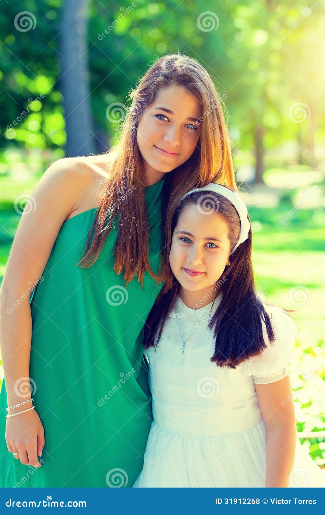 Two Sister in the First Communion Day Stock Photo - Image of playful ...