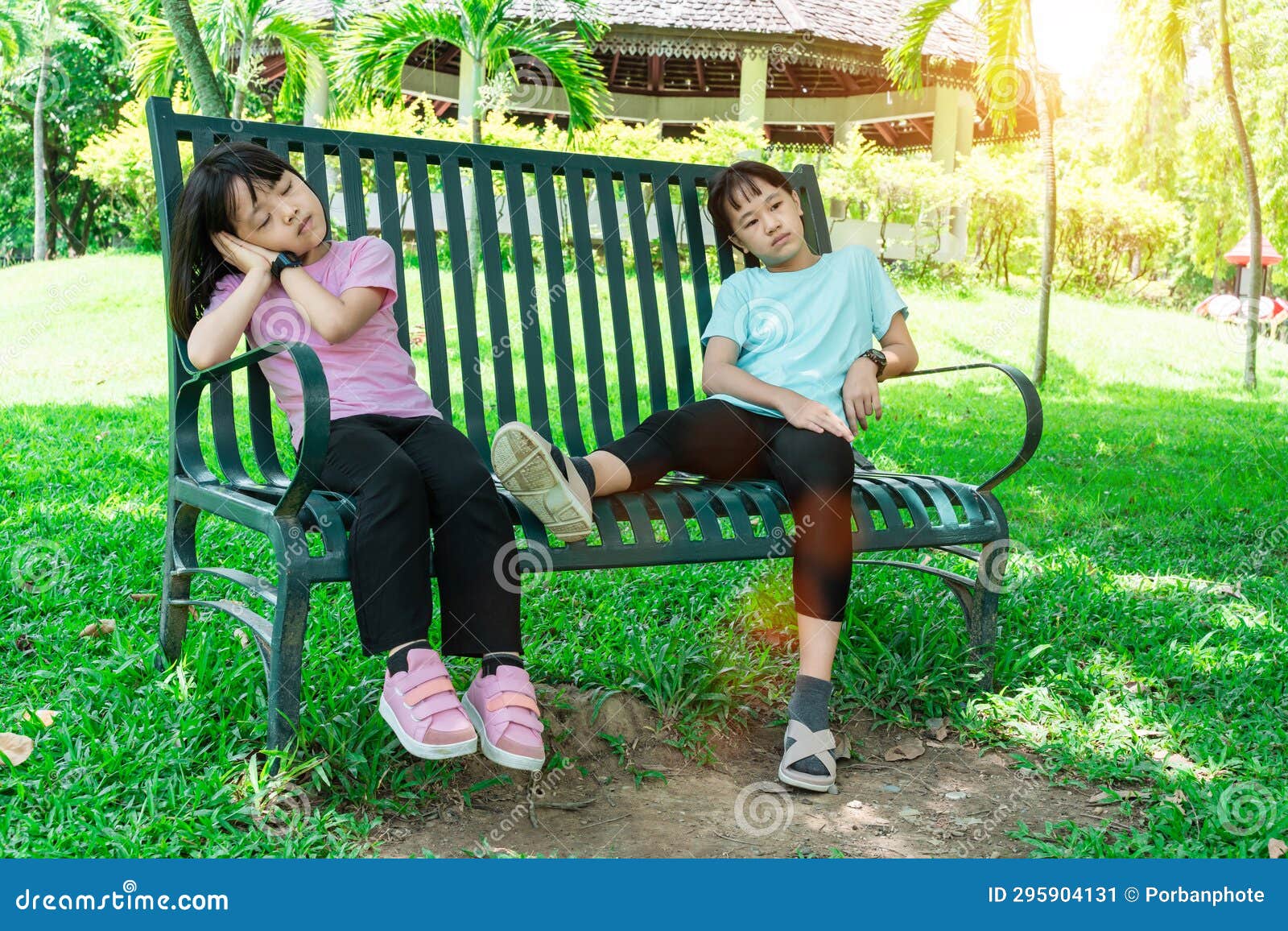 Two Sister Sitting on a Bench in an Green Park Stock Image - Image of ...