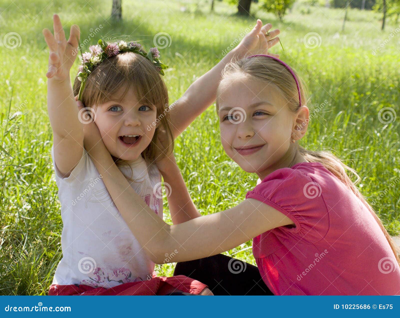 Two sisters stock photo. Image of grass, cheerful, little - 10225686