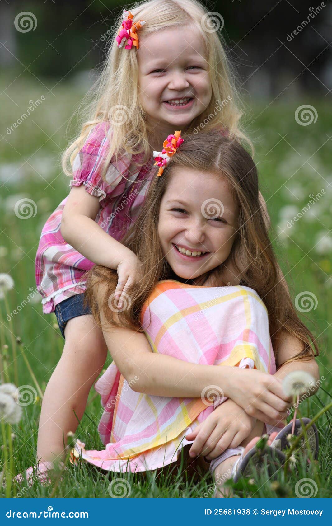 Two sisters stock photo. Image of dandelion, female, childhood - 25681938