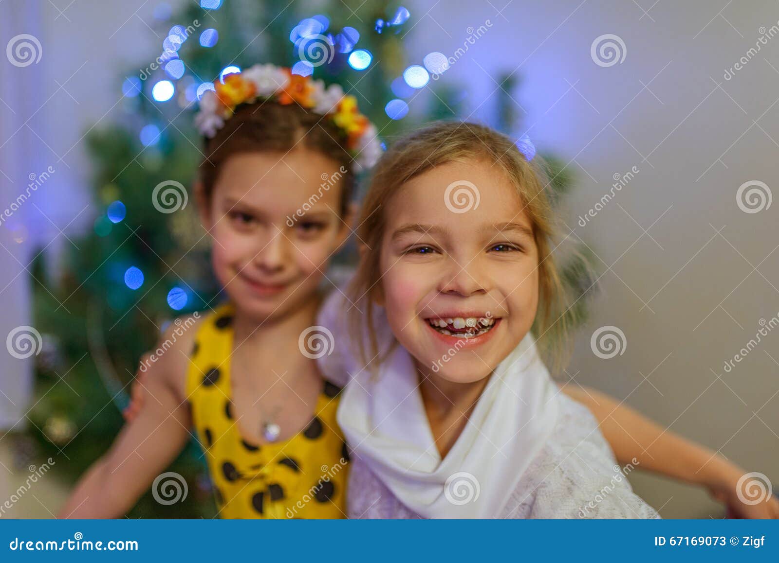 Two Sisters Around Christmas Tree Stock Image - Image of people ...