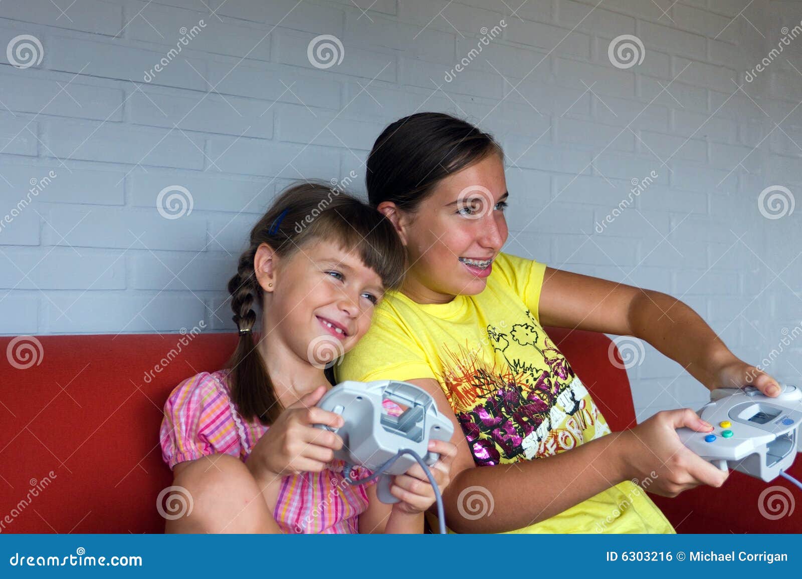 Two Sisters Battle with Video Game Stock Photo - Image of video, xbox ...